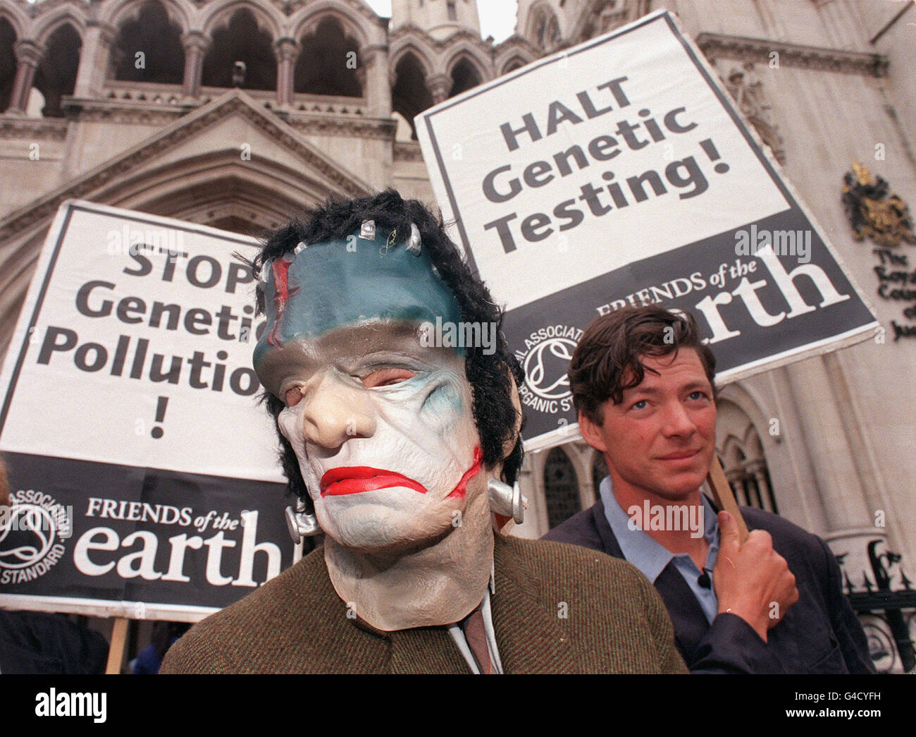 Guy Watson (right) joins protesters outside the High Court in London ...