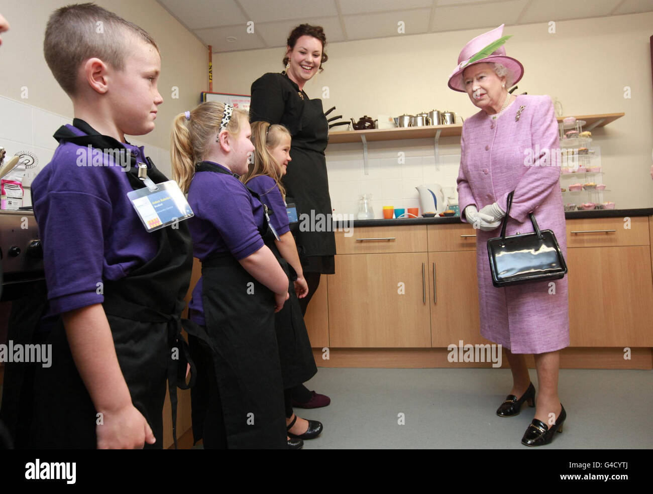 Queen Elizabeth II meets pupils from St. Michael's Primary School ...