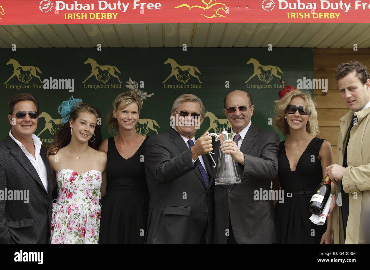 r Micheal Tabor (3rd right) and trainer David Wachman (right) of ...