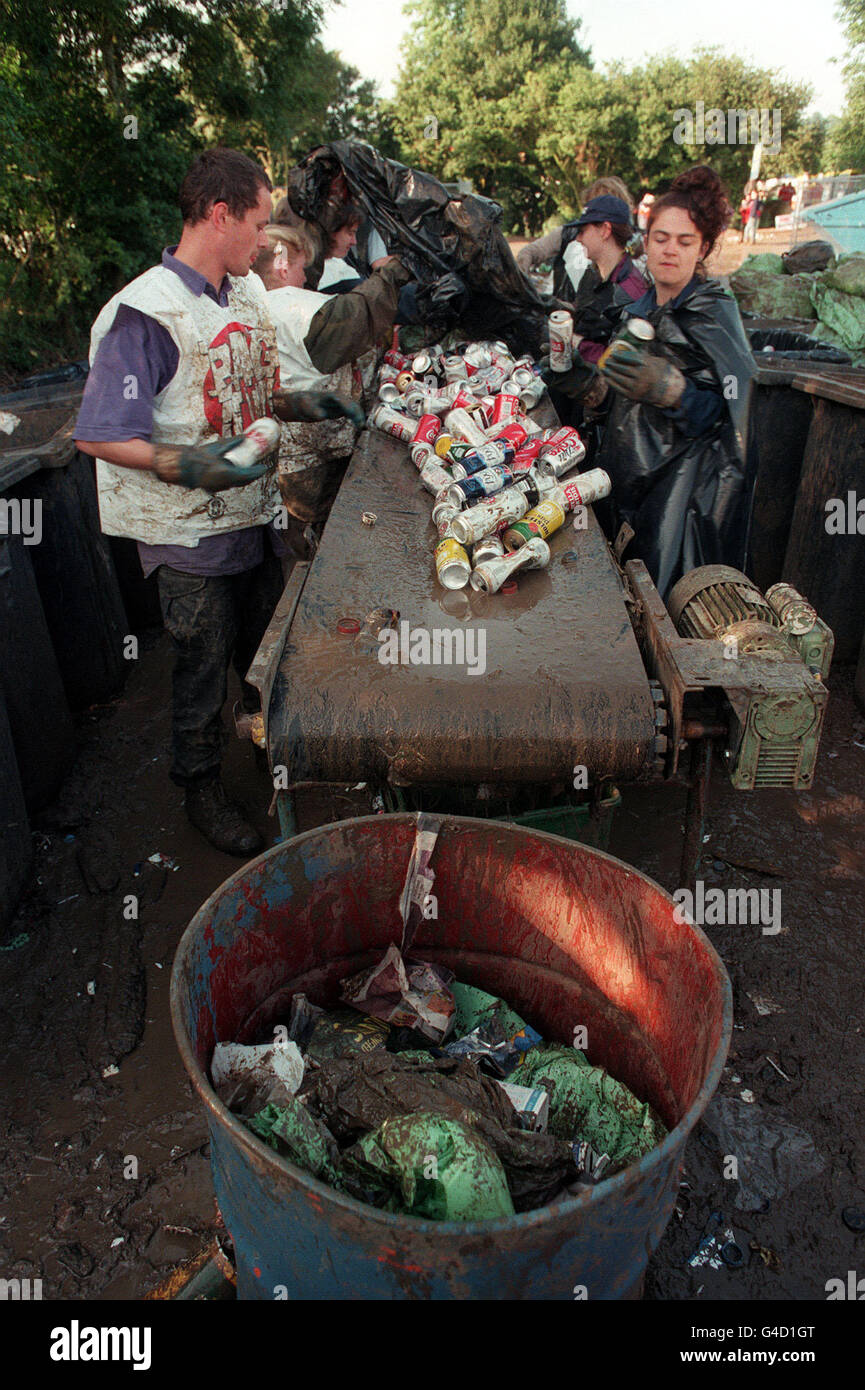 Tin cans sorted ready recycling mud rain drenched glastonbury festival ...