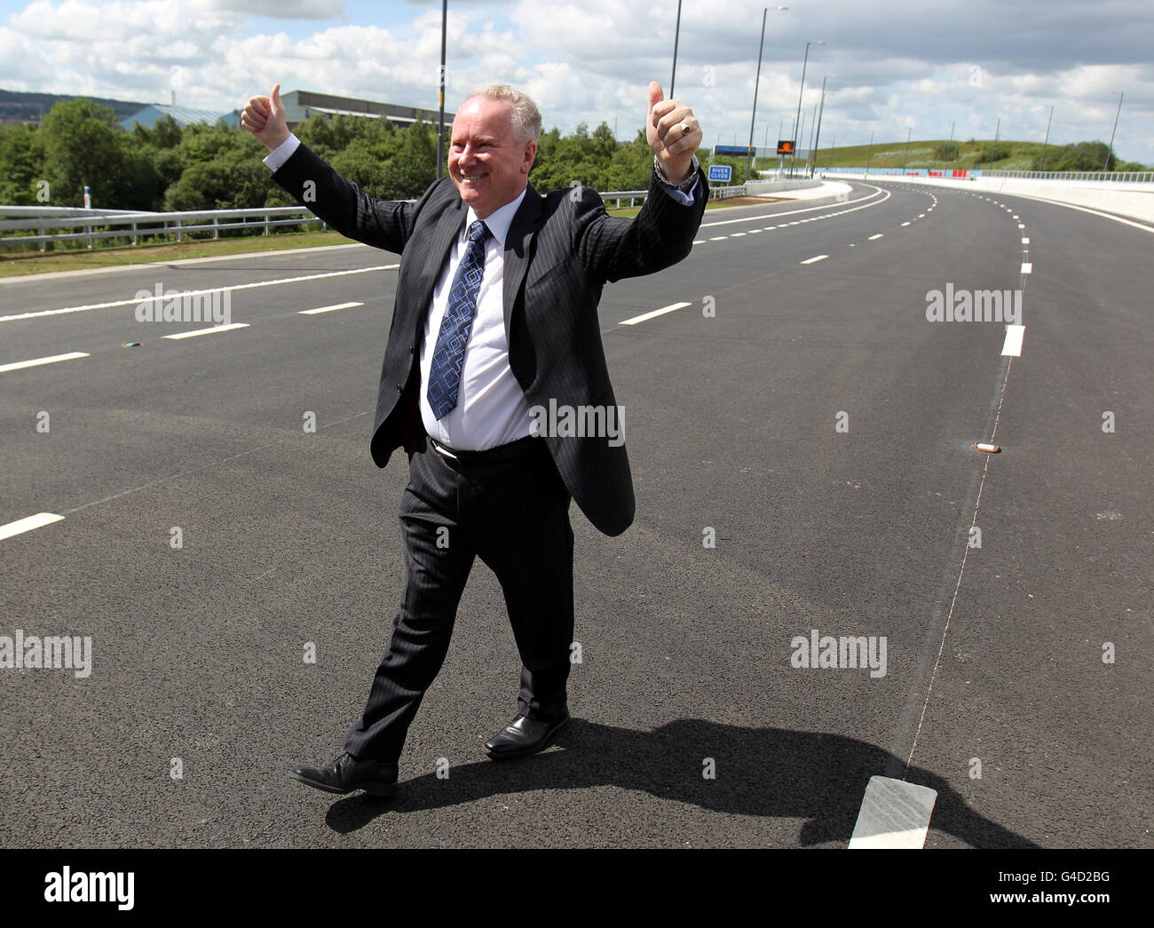 Infrastructure Secretary Alex Neil M.S.P walks on the M74 extension ...