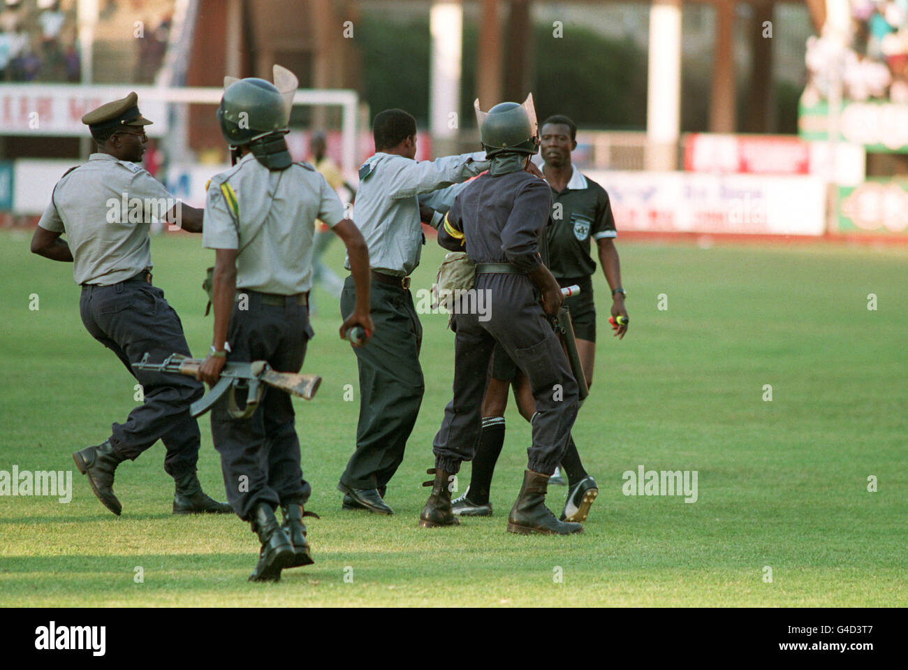 Zimbabwe zaire armed police come to the aid of referee hi-res stock ...
