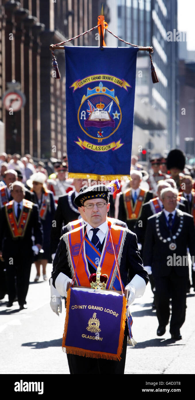 An Orange Order parade makes its way through Glasgow in Scotland Stock ...