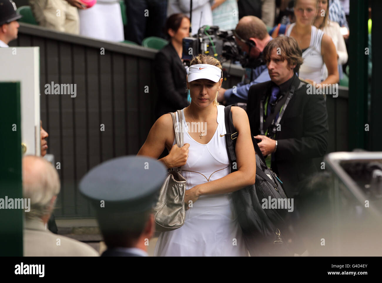 Russia s Maria Sharapova Looks Dejected As She Walks Off Centre Court Russia s Maria Sharapova Looks Dejected As She Walks Off Centre Court