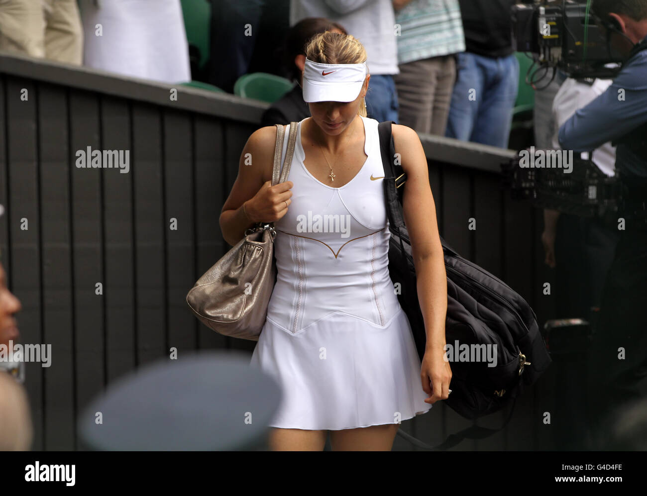 Russia s Maria Sharapova Looks Dejected As She Walks Off Centre Court Russia s Maria Sharapova Looks Dejected As She Walks Off Centre Court