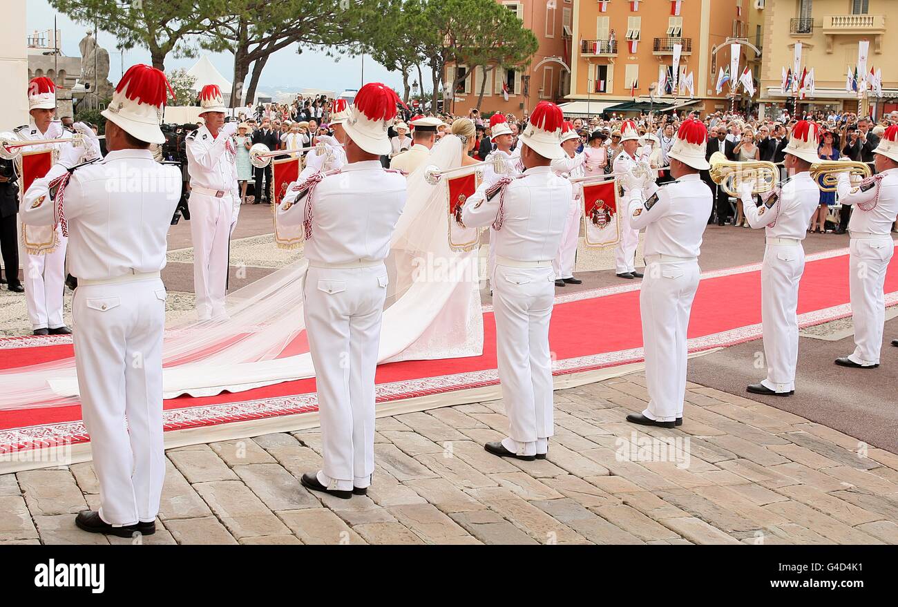 Prince Albert II of Monaco and Charlene Wittstock leave the Place du ...