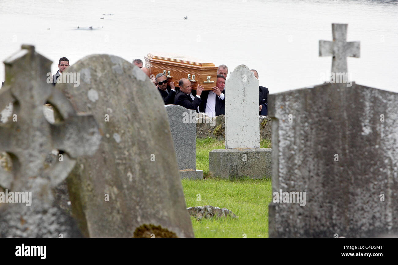 The coffin of Johnny Curry is carried into St Thomas' Church of Ireland ...