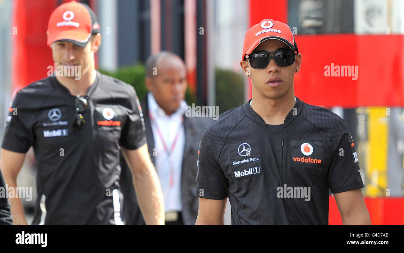 McLaren Mercedes' Lewis Hamilton and Jenson Button make their way down ...