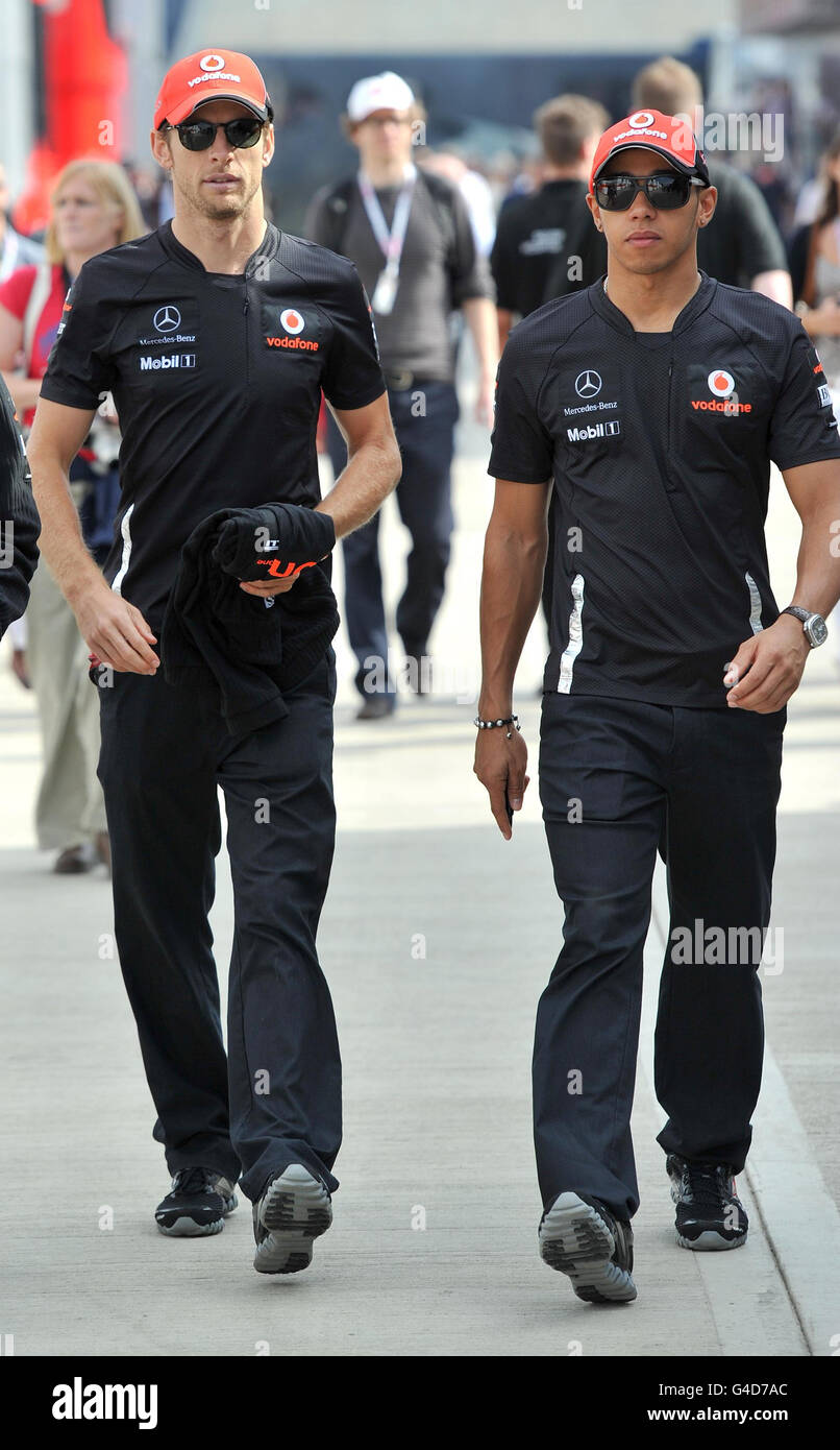 McLaren Mercedes' Lewis Hamilton and Jenson Button make their way down ...