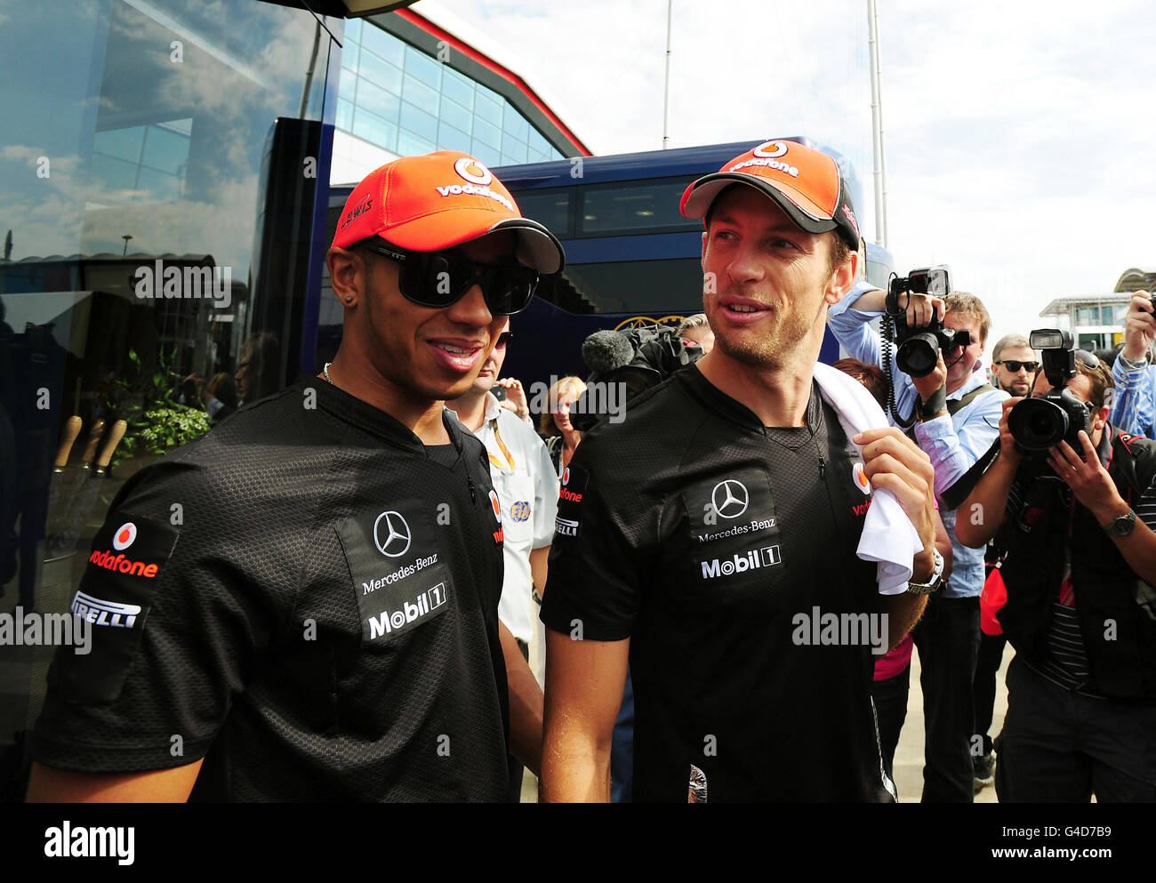 McLaren's Mercedes Lewis Hamilton (left) with Jenson Button in the ...