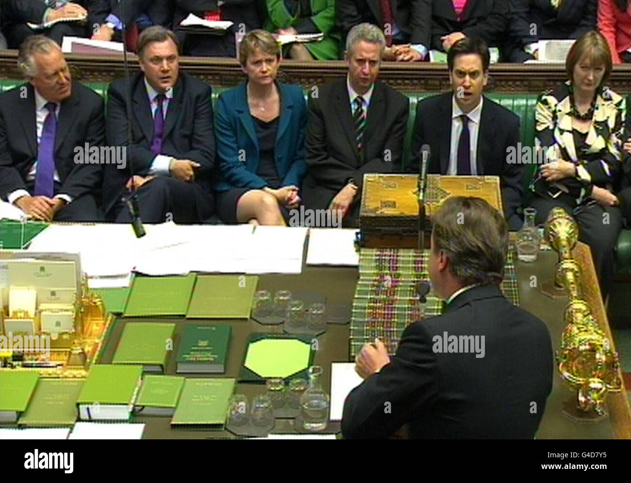 The Labour front bench listen as Prime Minister David Cameron speaks ...