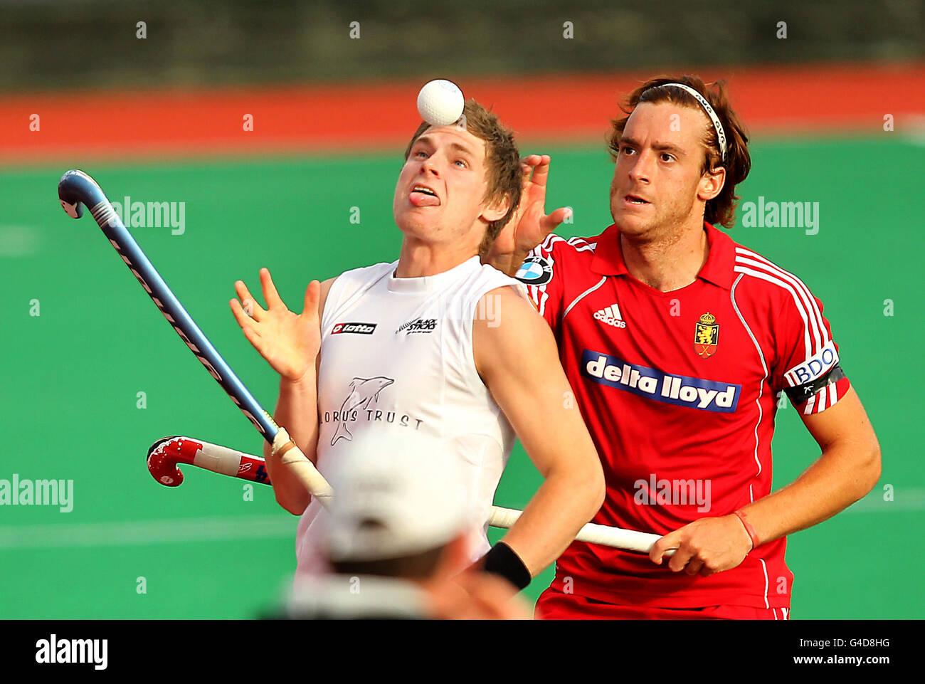 New Zealand's Stephen Jenness in action against Belgium's John ...