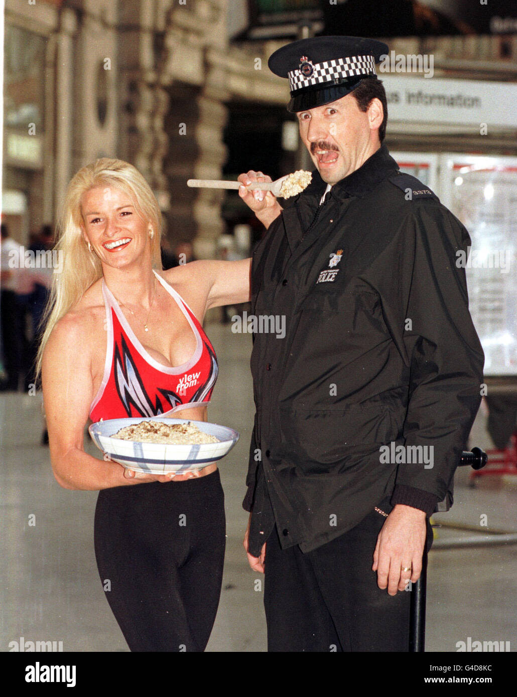TV GLADIATOR LIGHTNING, KIM WILLIAMS, FEEDS A POLICEMAN FROM A STEAMING ...