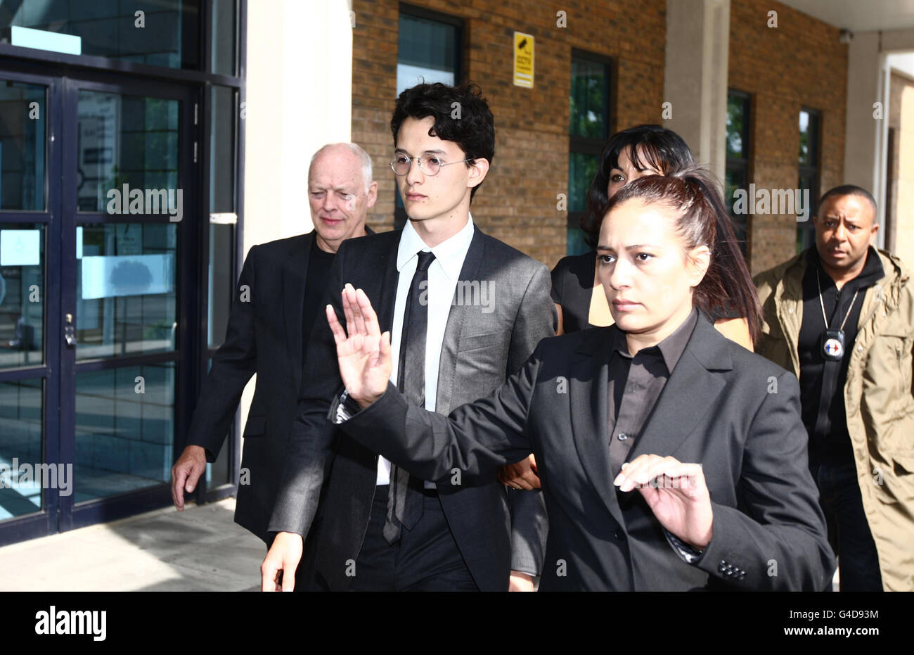 Charlie Gilmour arrives at Kingston Crown Court with his father David ...