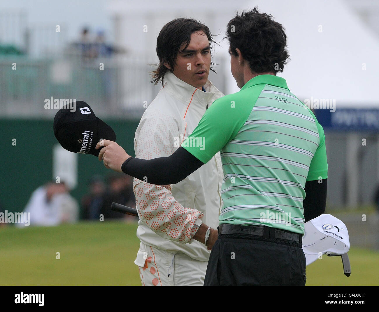 Ricky Fowler (left) congratulates Rory McIlroy after finishing their ...