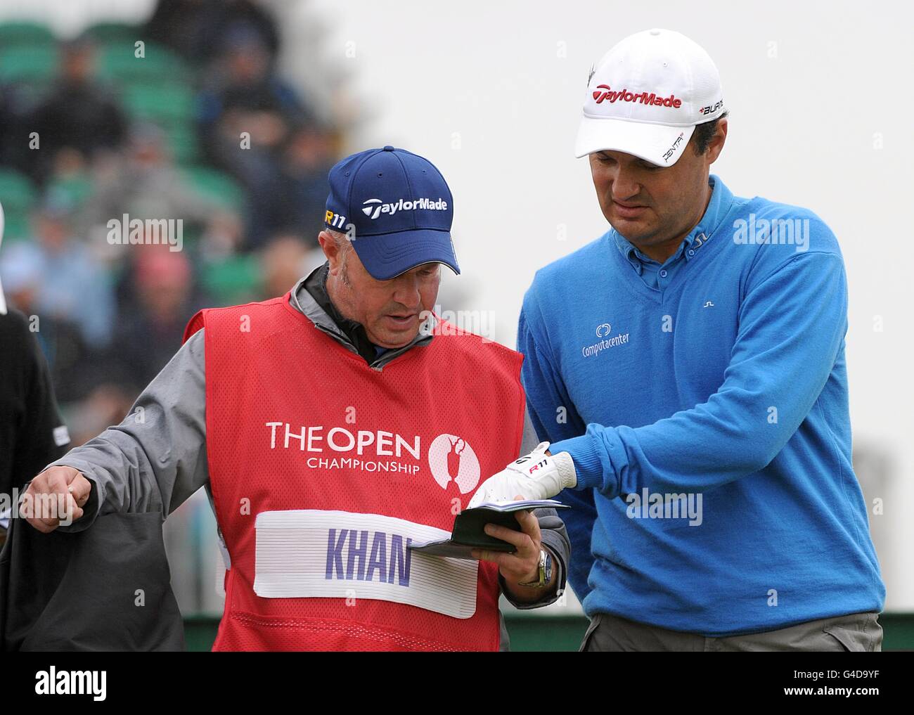 England's Simon Khan (right) with caddy Stan Mercer during round three ...