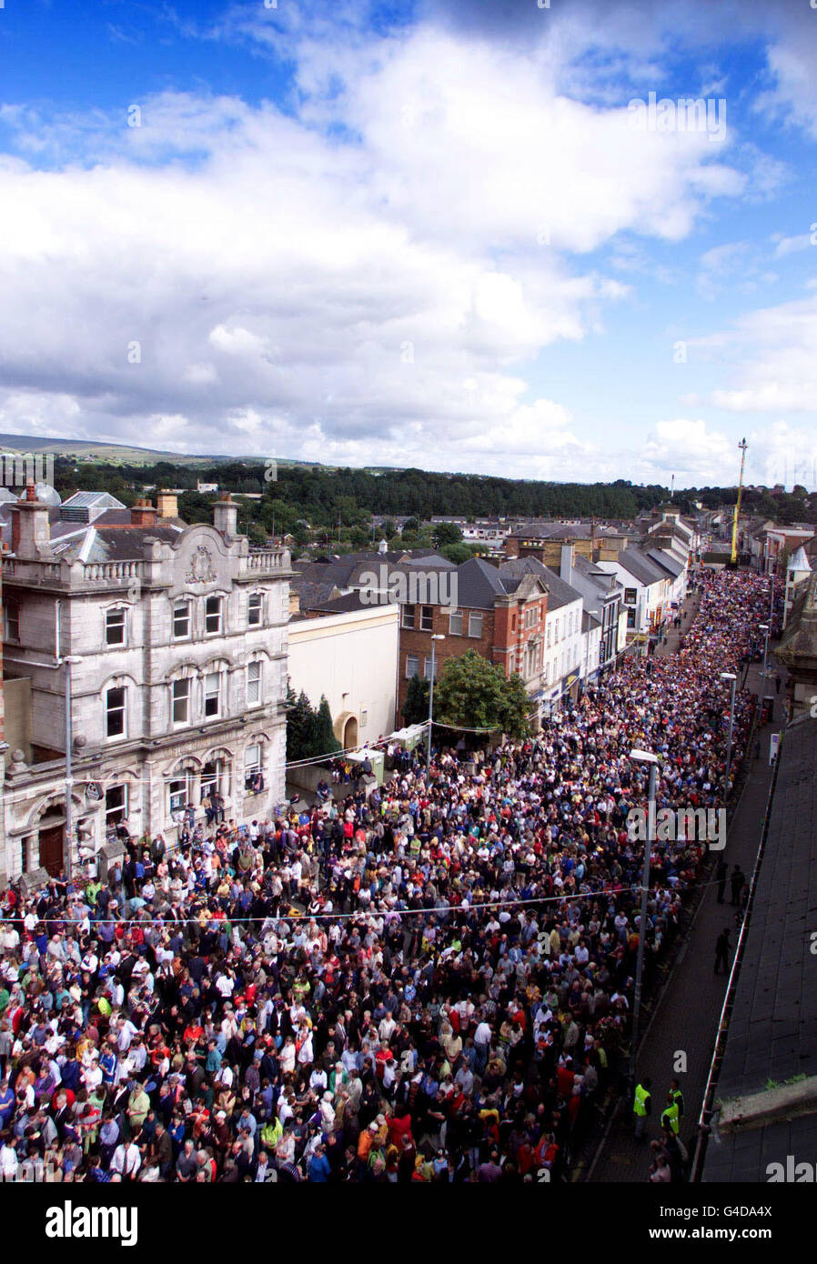 Thousands of people take part in a memorial service in the heart of ...