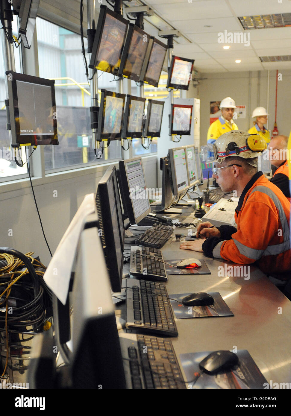 A general view of a worker inside the control room of the rail track ...