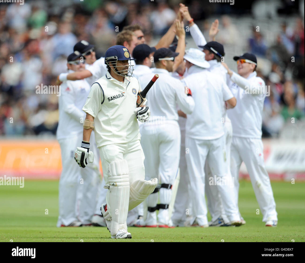 India's Sachin Tendulkar leaves the field after being caught behind for ...