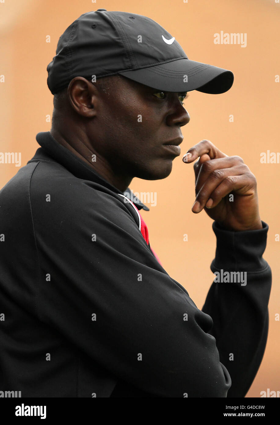 Kettering town manager morell maison looks on from the touchline hi-res ...