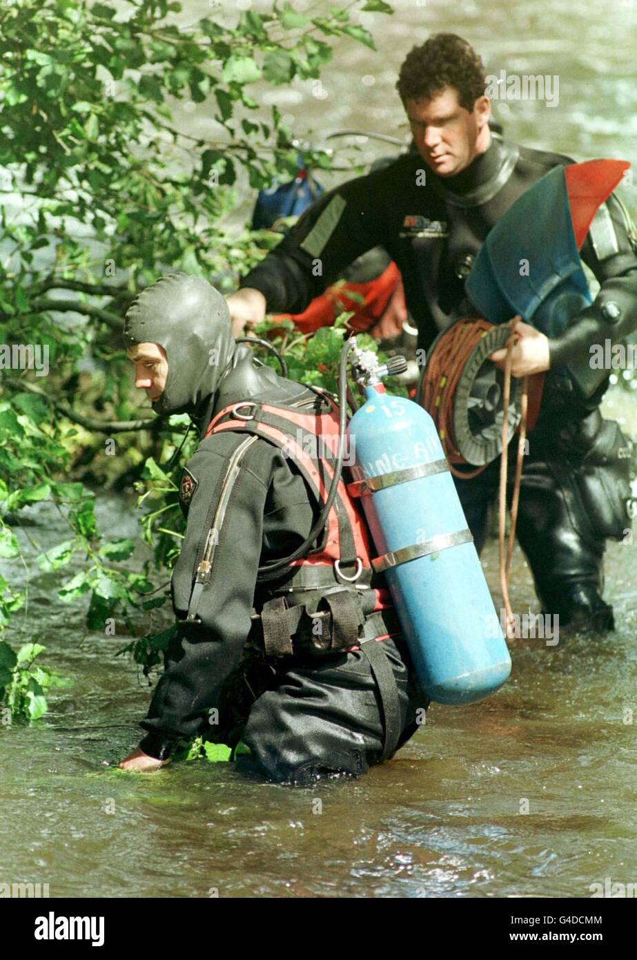 Police divers in the River Dane, Congleton in Cheshire today (Sunday ...