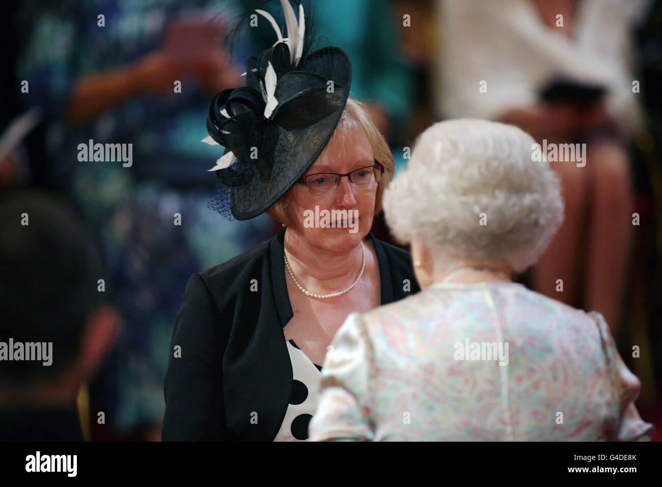 Mrs Susan O'Neill from Huddersfield is made an MBE by Queen Elizabeth ...