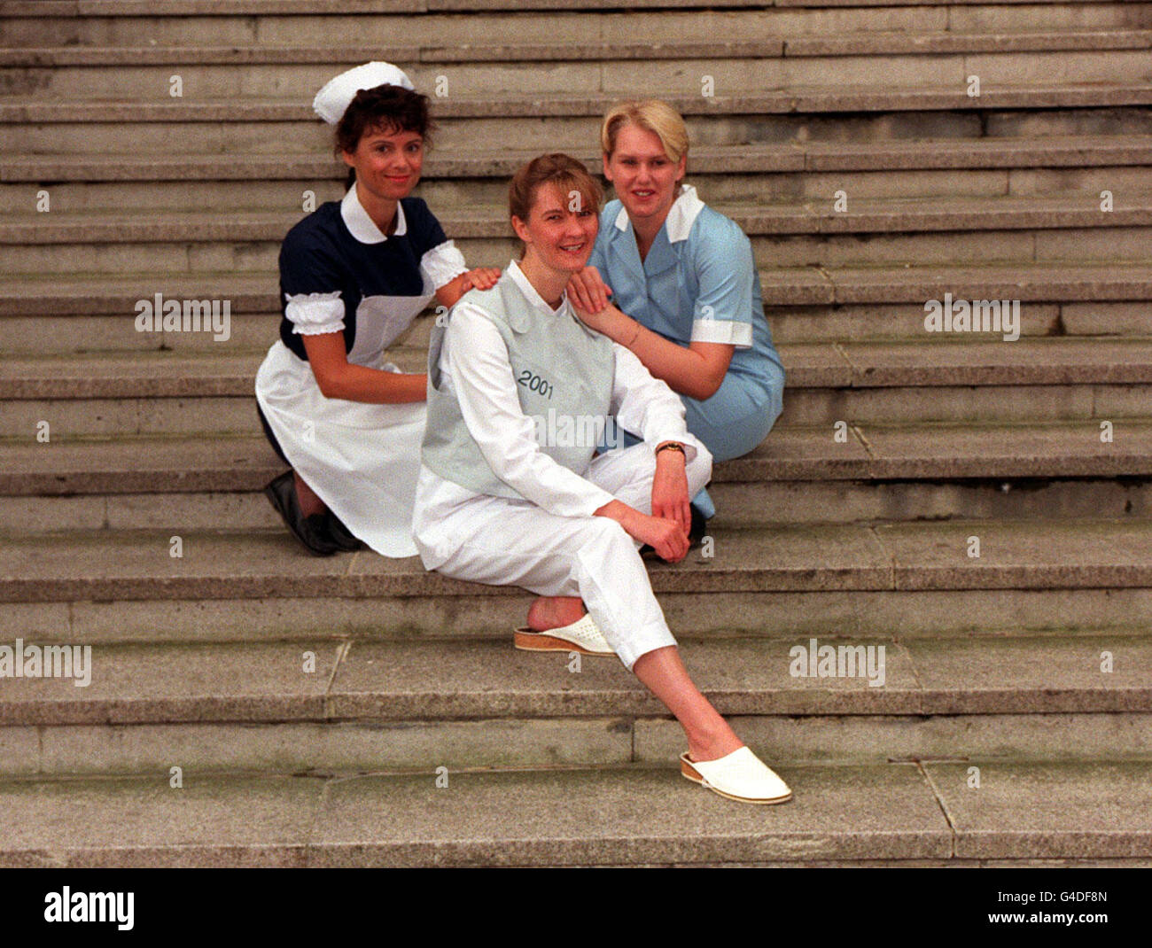 Nurses from the Royal Marsden Hospital model uniforms dating from three ...