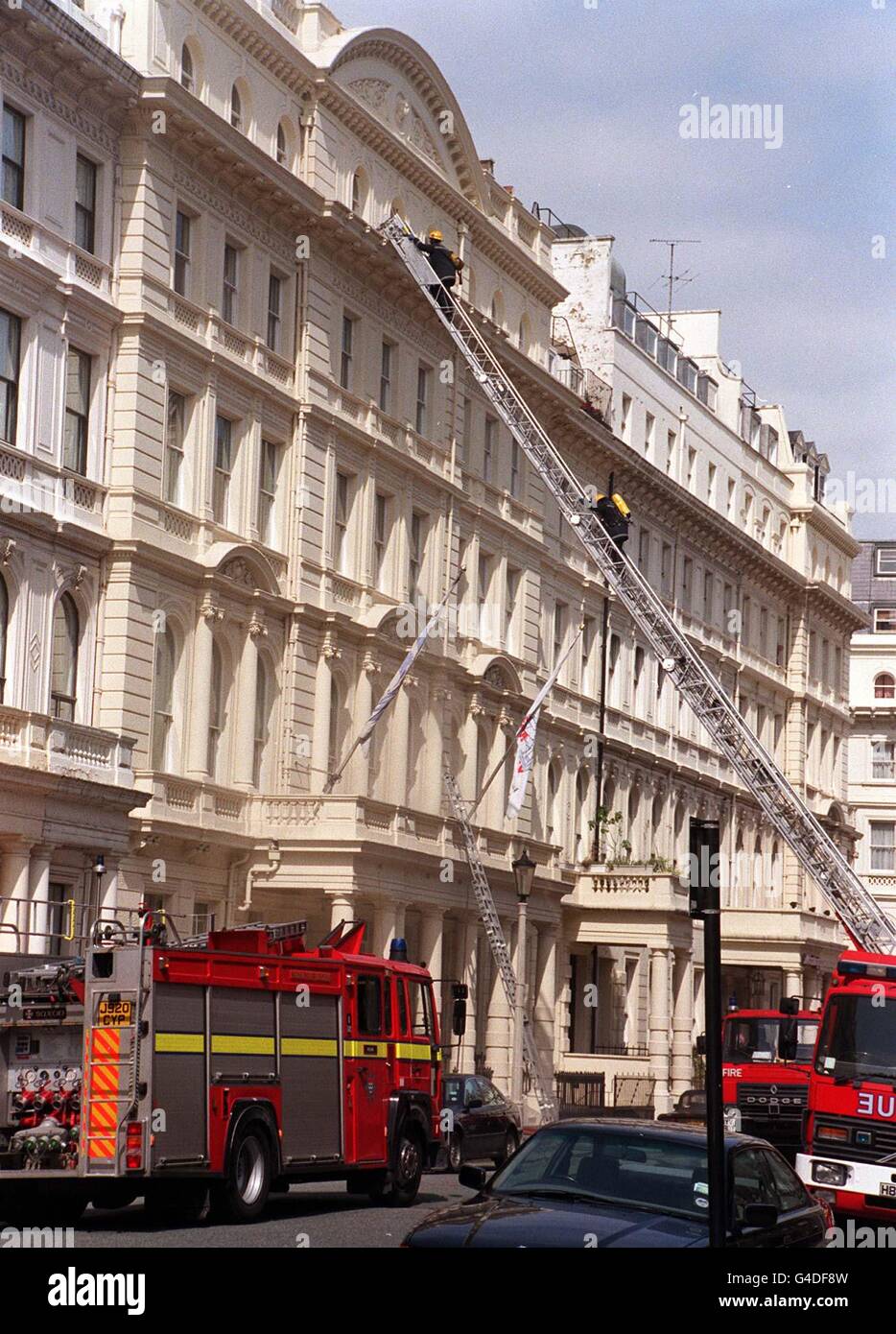 Fire fighters attend the scene of a blaze at the London headquarters of ...