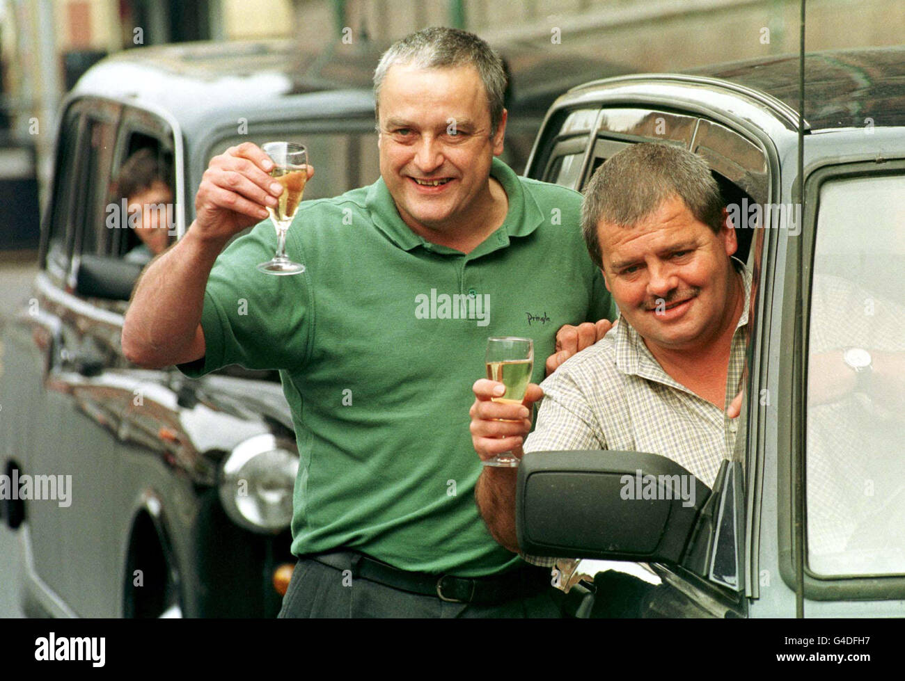 Roy Gibney from Grimsby (left) and Robert Gale of Altringham celebrate ...