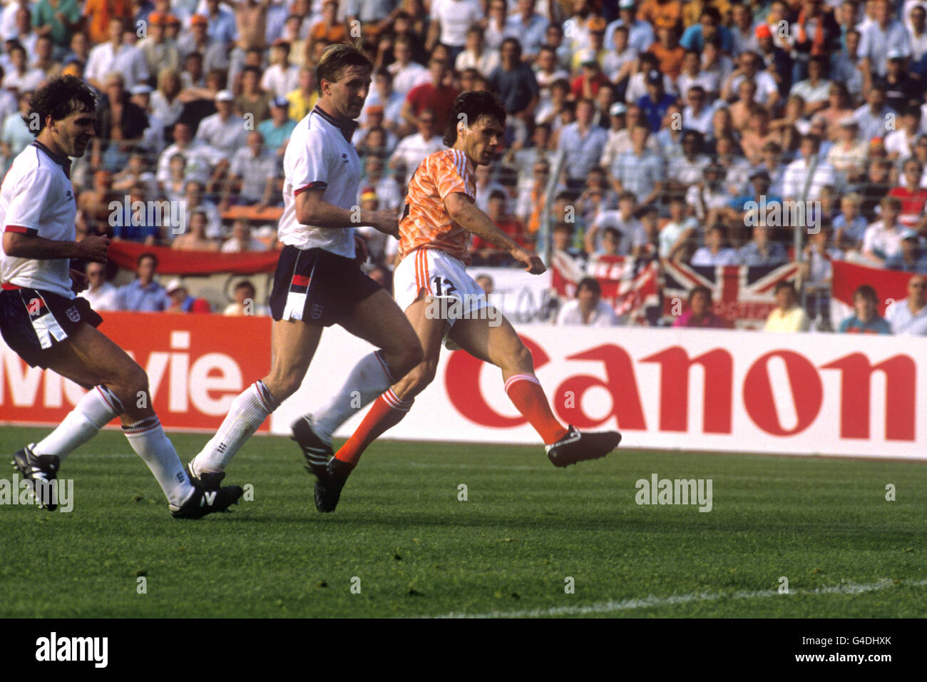 England Captain Bryan Robson (l) and teammate Gary Stevens (c) can only ...