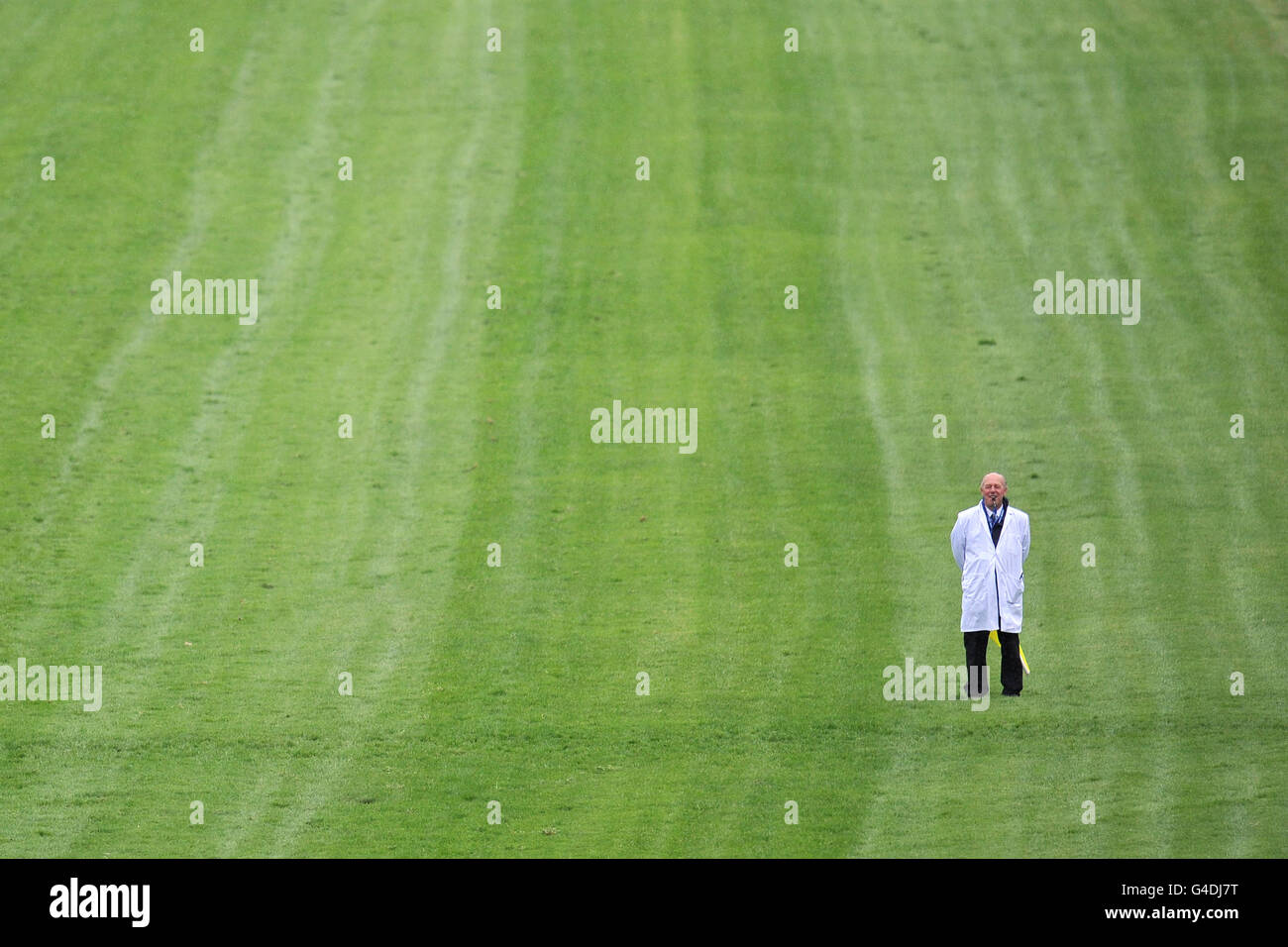 A course official waits to start the E.B.F Sixties Icon Fillies ...