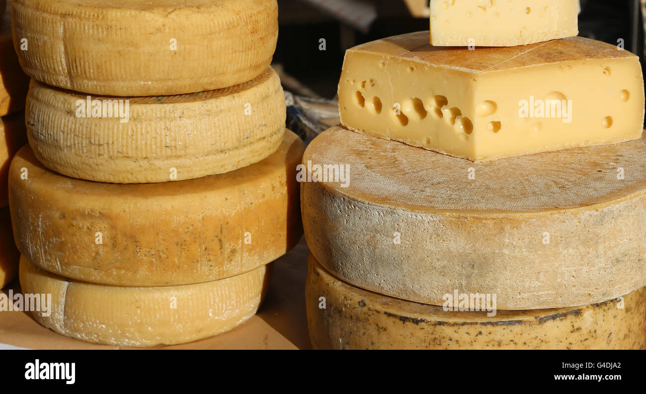 Many cheeses and aged cheeses on sale in the market Stock Photo - Alamy