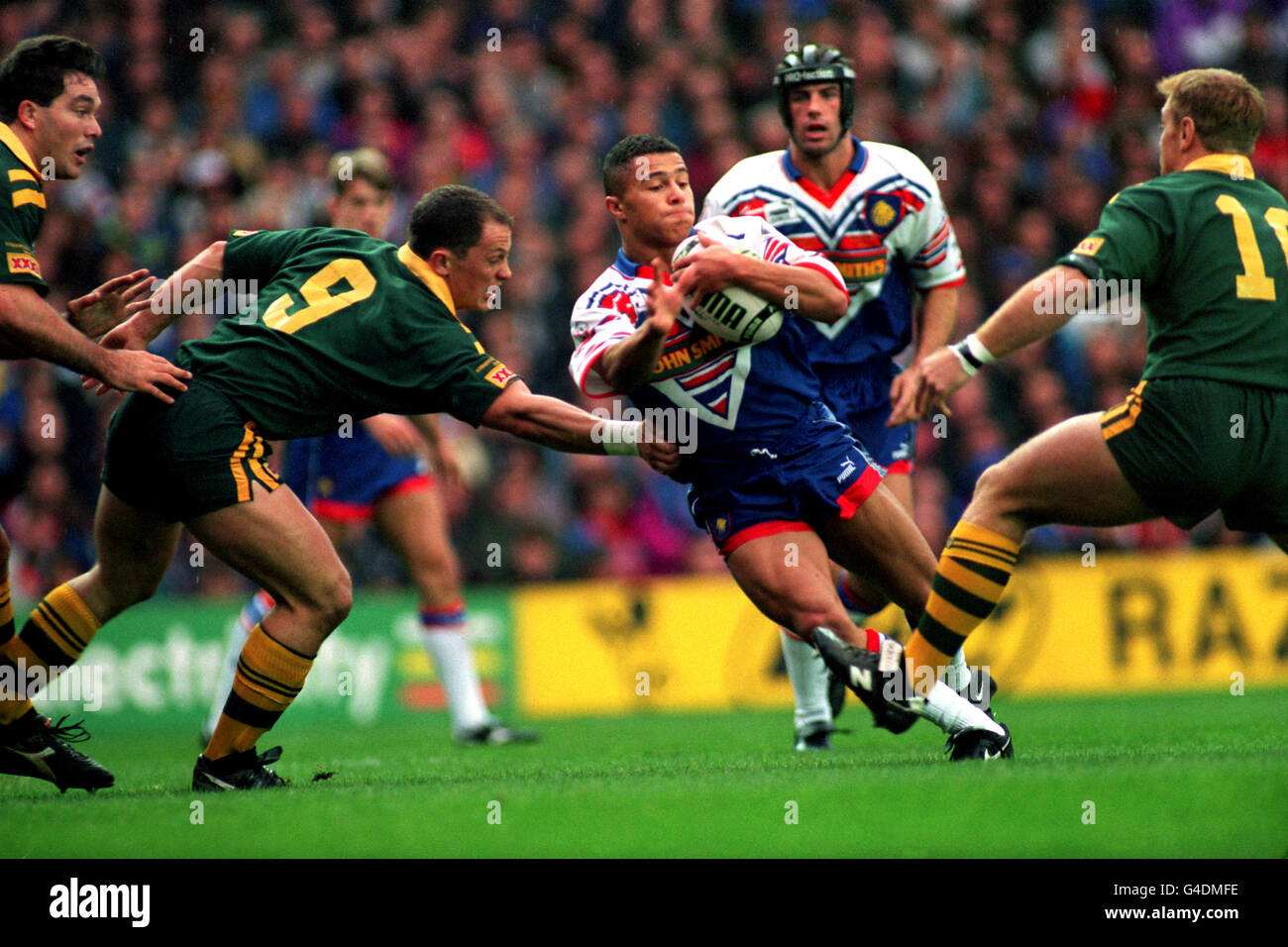 RUGBY LEAGUE. G B V AUSTRALIA - GB'S JASON ROBINSON TRIES TO DODGE ...