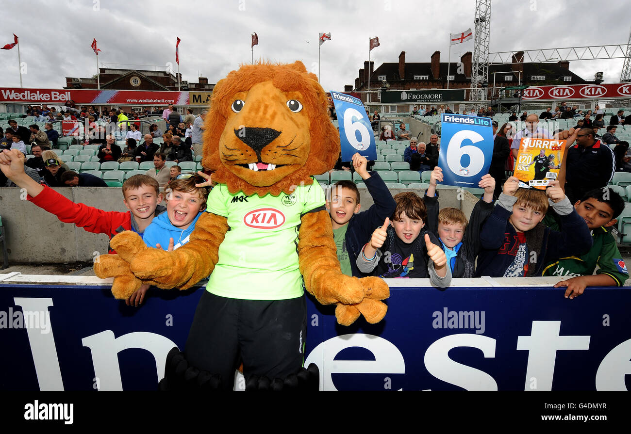 Surrey's mascot Caesar the Lion with some young cricket fans Stock ...
