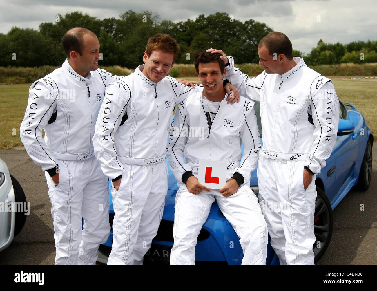 Steve Finn (centre right) is consoled after losing today's Jaguar ...