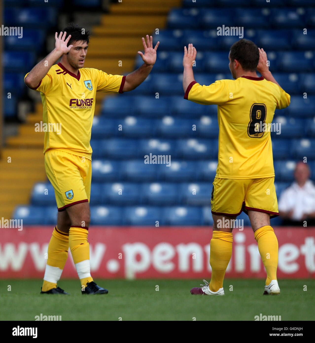 L-R; Burnley's Charlie Austin celebrates scoring the opening goal of ...