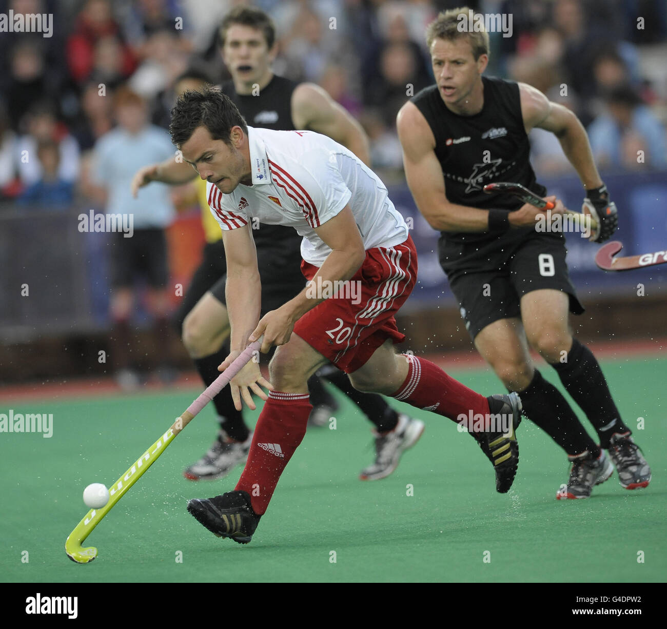 England's James Tindall (left) gets away from New Zealand's Dean ...