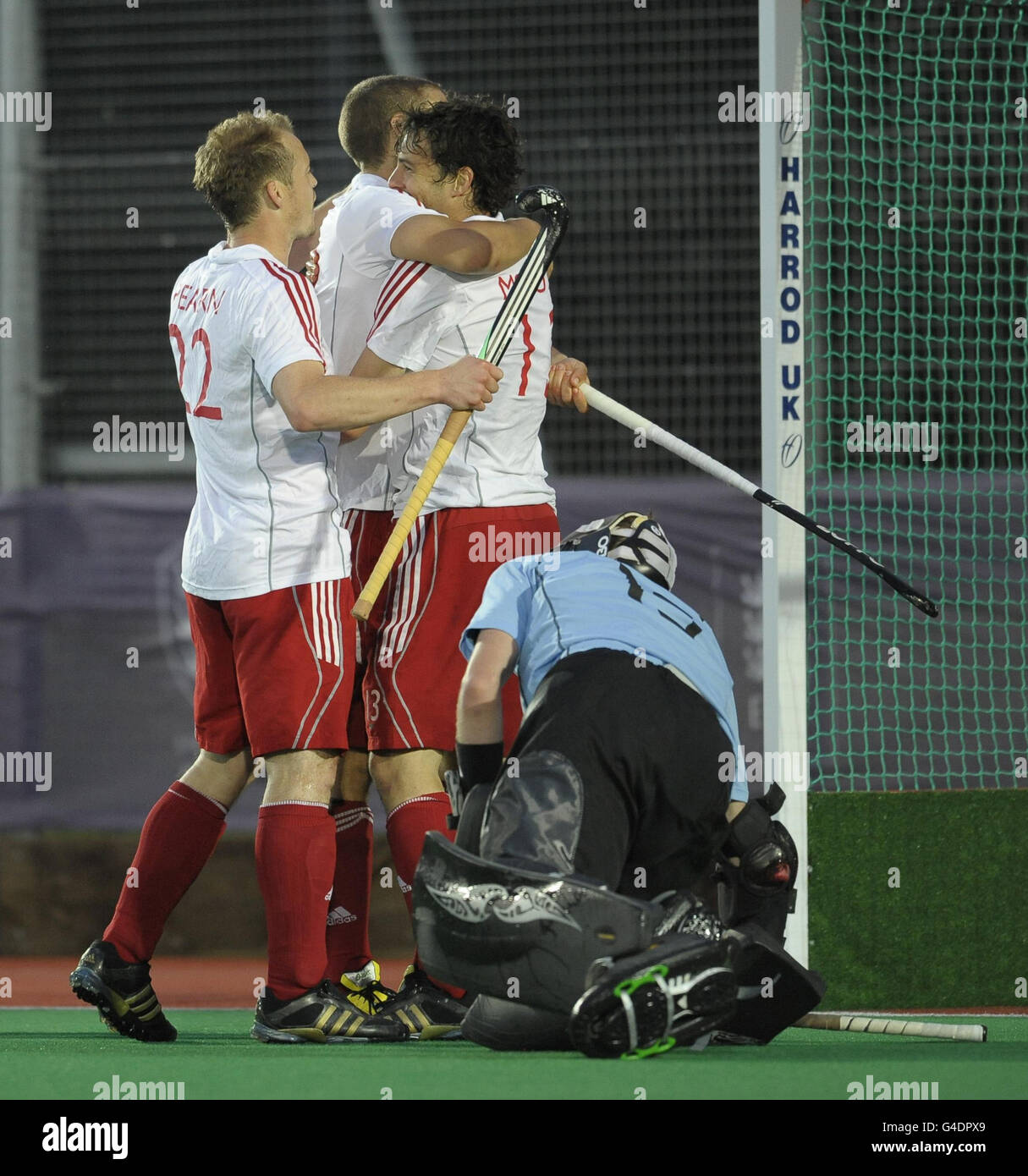 England's Rob Moore celebrates scoring the third goal with Richard ...