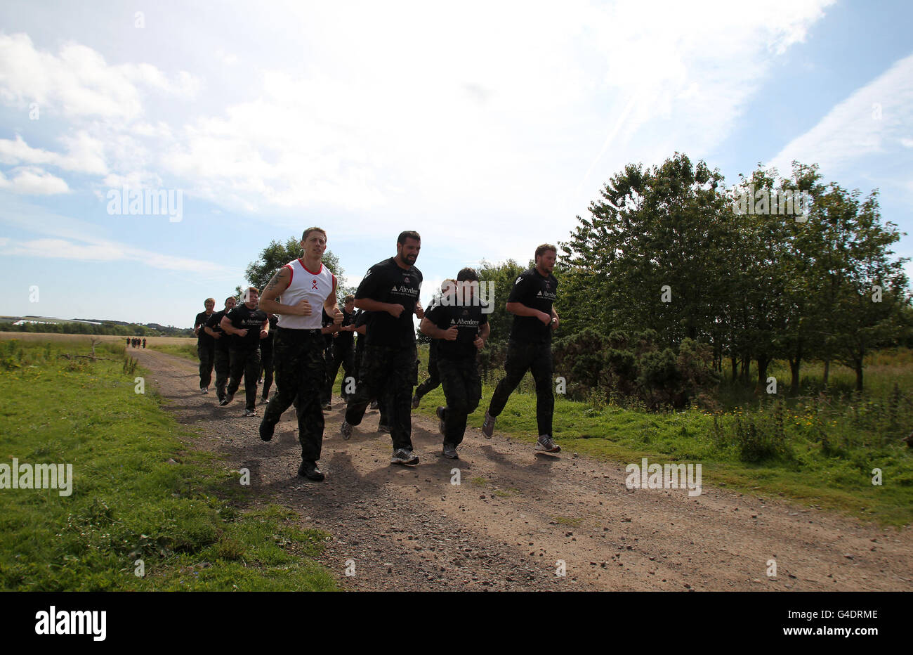 Edinburgh Rugby train with 45 Squadron during a photo session at the ...