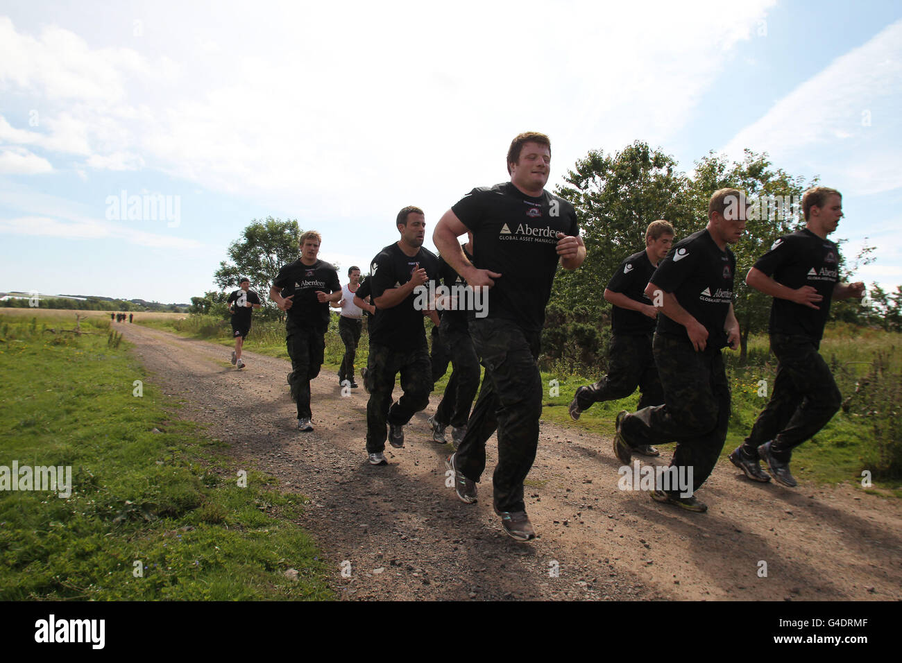 Edinburgh Rugby train with 45 Squadron during a photo session at the ...