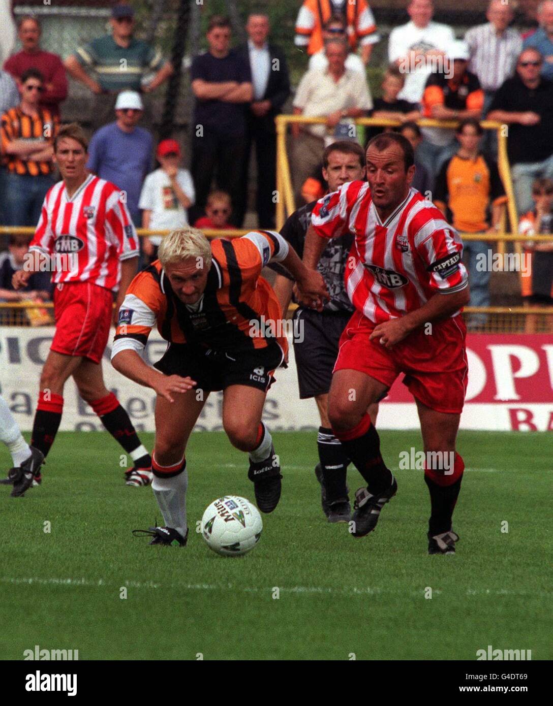 Barnet's Sean Devine forces past Warren Aspinall of Brentford at ...
