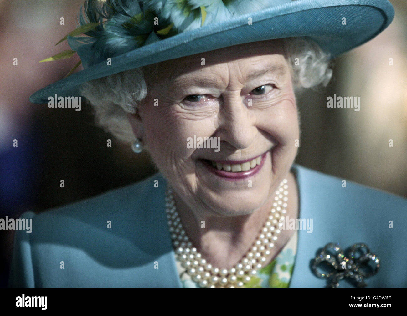 Queen Elizabeth II talks to staff members as she officially opened the ...