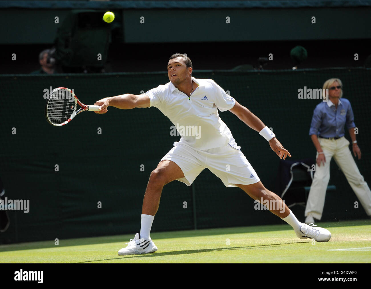 France's Jo-Wilfried Tsonga in action against Serbia's Novak Djokovic during day eleven of the ...