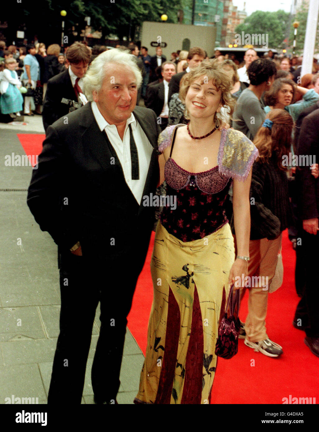 PA NEWS PHOTO 14/7/98 FILM DIRECTOR MICHAEL WINNER AND HIS GIRLFRIEND ...