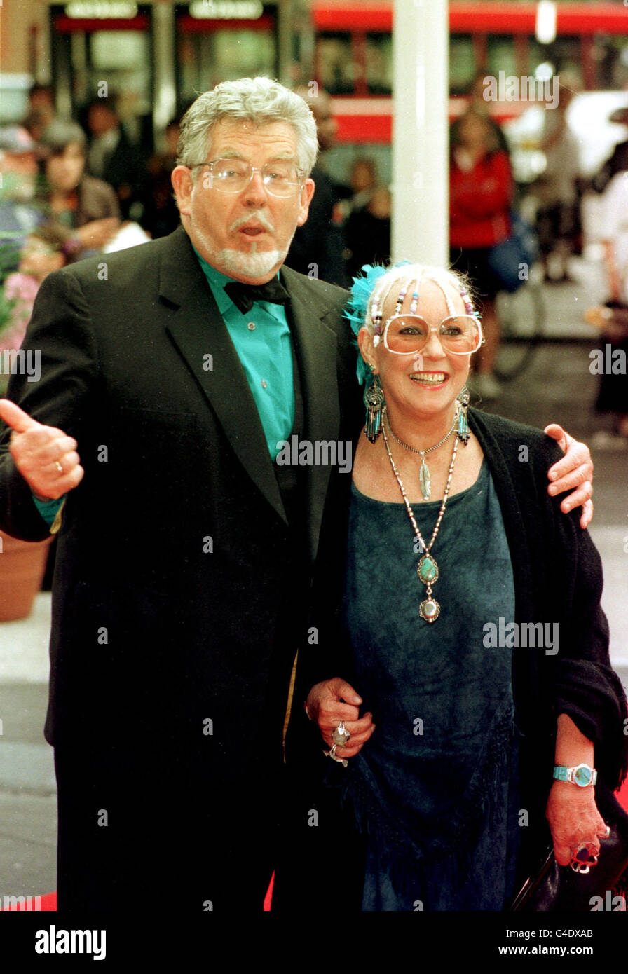 PA NEWS PHOTO 14/7/98 ROLF HARRIS AND HIS WIFE ALWEN ARRIVE FOR THE ...