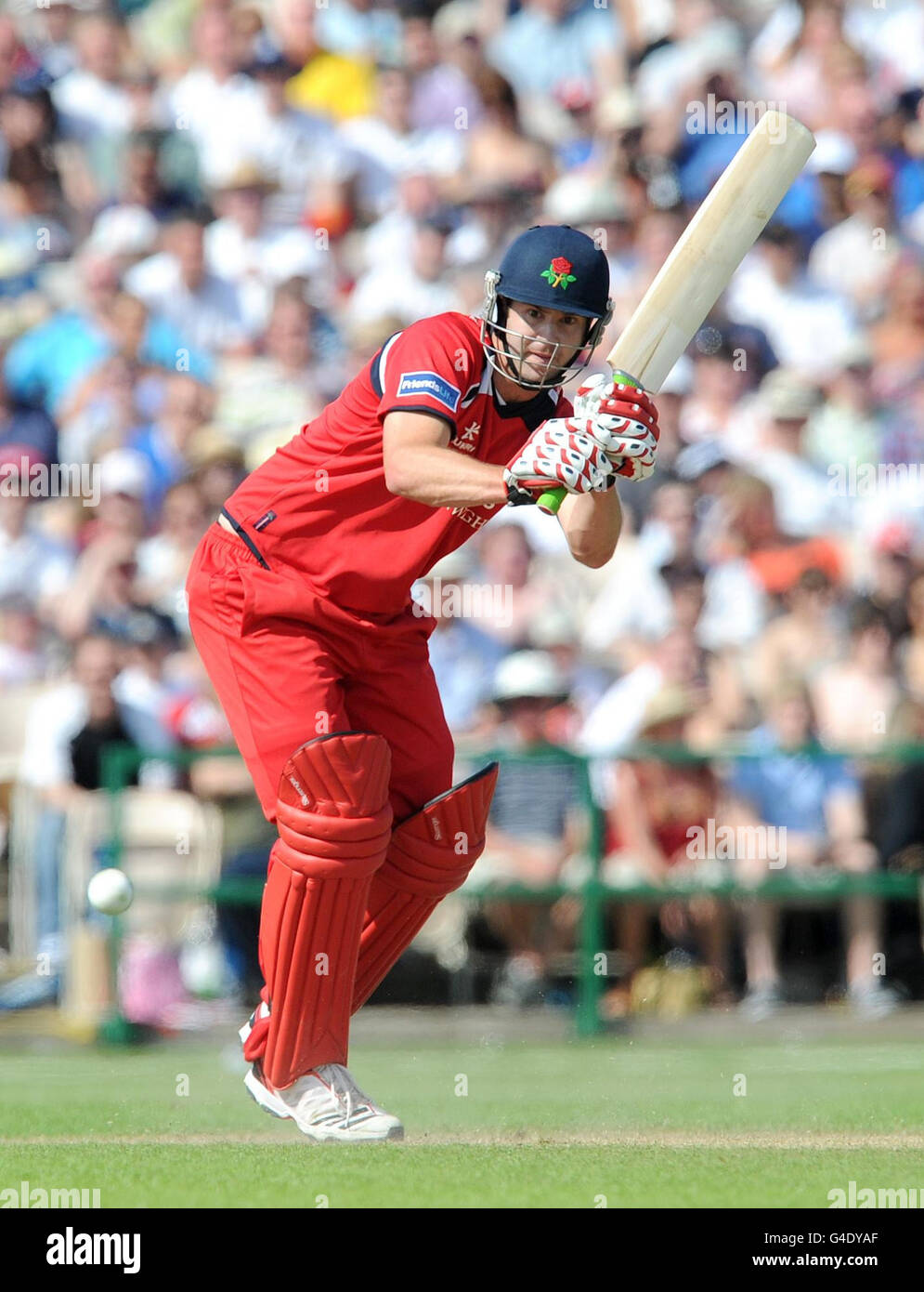 Lancashire's Tom Smith hits out watched by Derbyshire wicket keeper ...
