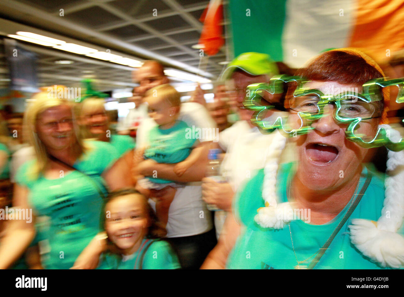 Friends and family of Team Ireland athletes cheer them home in the ...