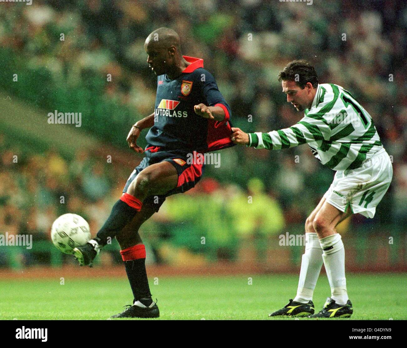 Celtic's Paul Lambert holds back St Patrick's Leon Braithwaite during ...