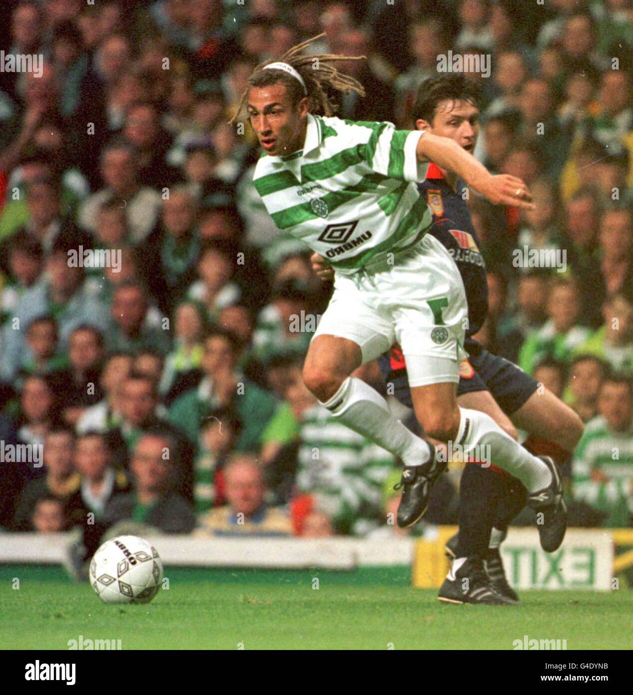 Celtic's Henrik Larsson goes past St. Patrick's Athletic's Martin ...