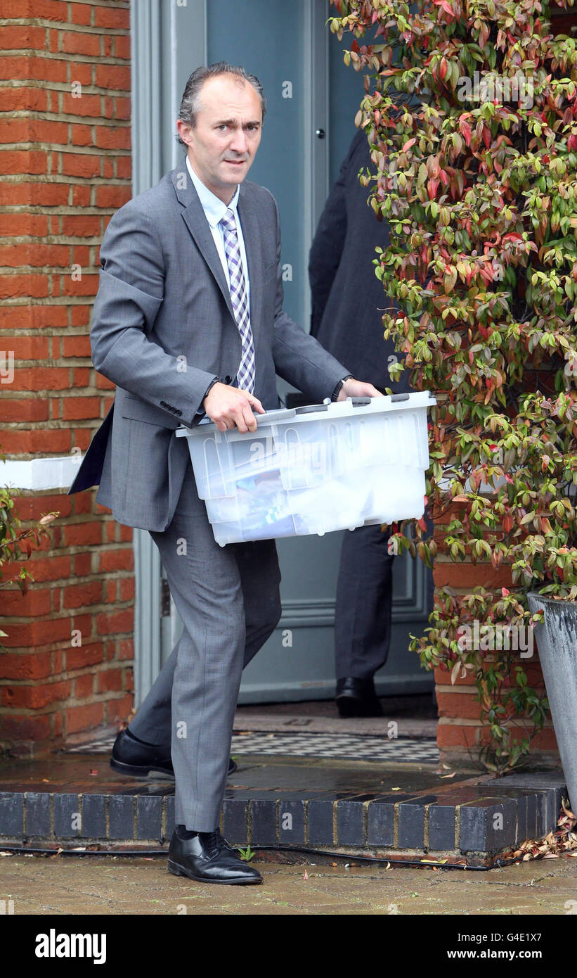 Police officers at Andy Coulson's house in South London. Mr Coulson ...